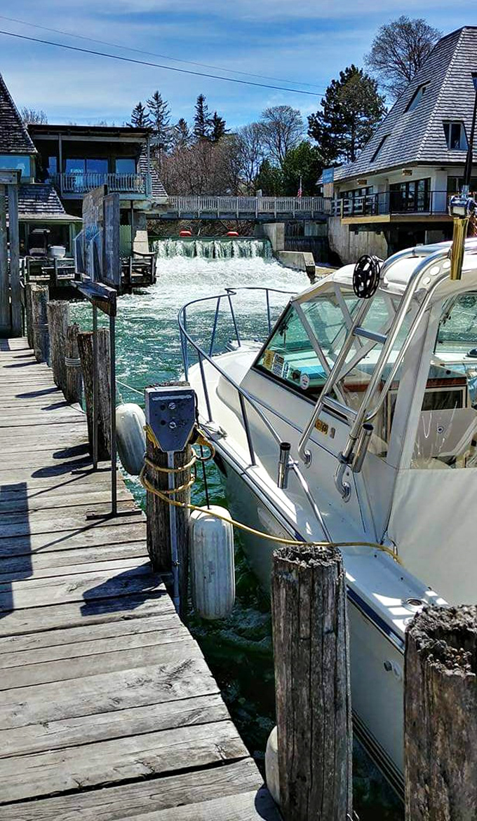 Charter boats rest easy after honest work, ready for tomorrow's adventures on Michigan's liquid playground