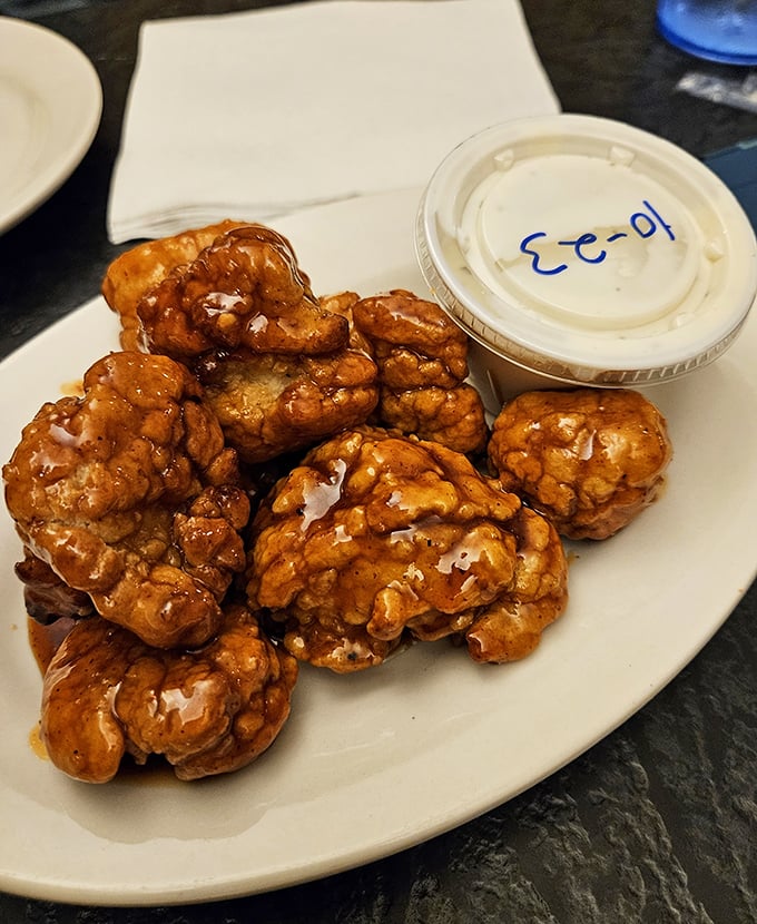 These honey-glazed boneless wings aren't trying to win beauty contests &ndash; they're too busy conquering taste buds instead.