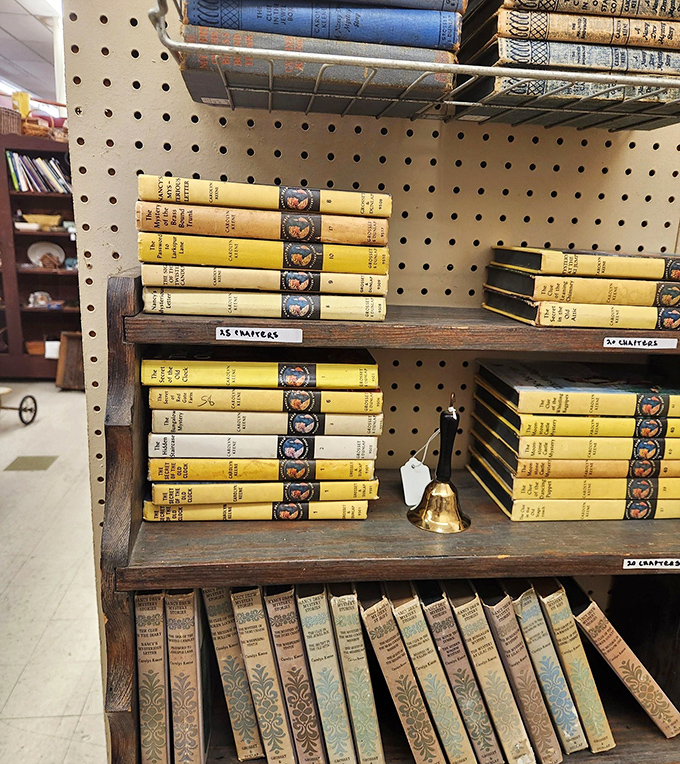 Rows of vintage Nancy Drew mysteries await new sleuths – these yellow spines have solved more cases than most detectives.