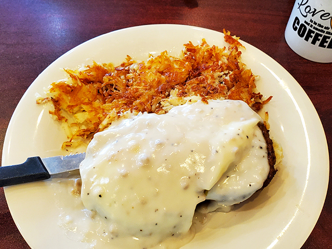Country fried perfection meets hash brown artistry. This isn't just breakfast&mdash;it's what your taste buds would order if they could drive themselves to Florida.