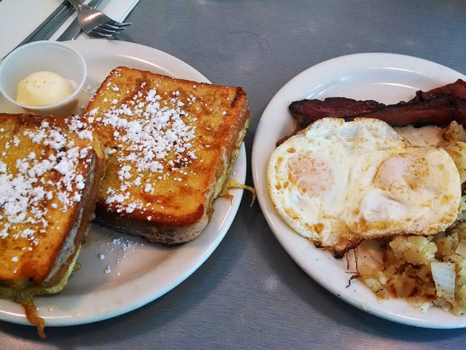 French toast dusted with powdered sugar on one plate, eggs and potatoes on another&mdash;a breakfast duet that Mozart himself would have composed if he'd been a chef.