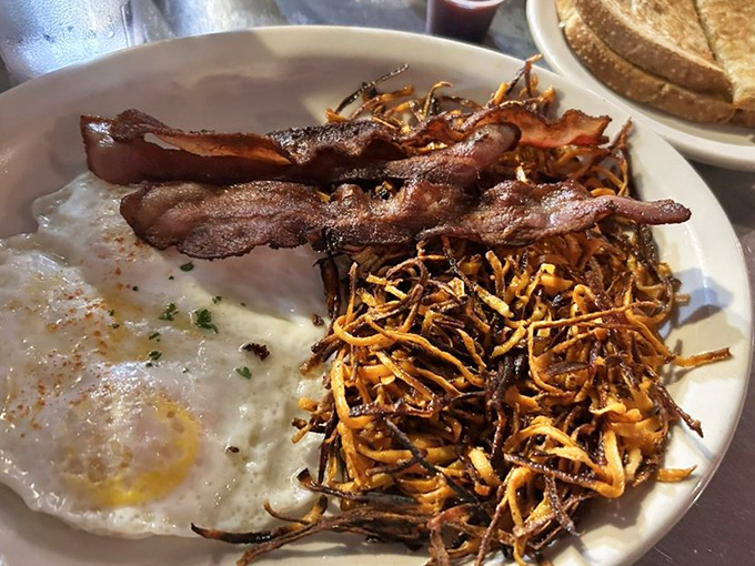 That first bite when perfectly poached eggs meet crispy potatoes &ndash; pure morning magic.