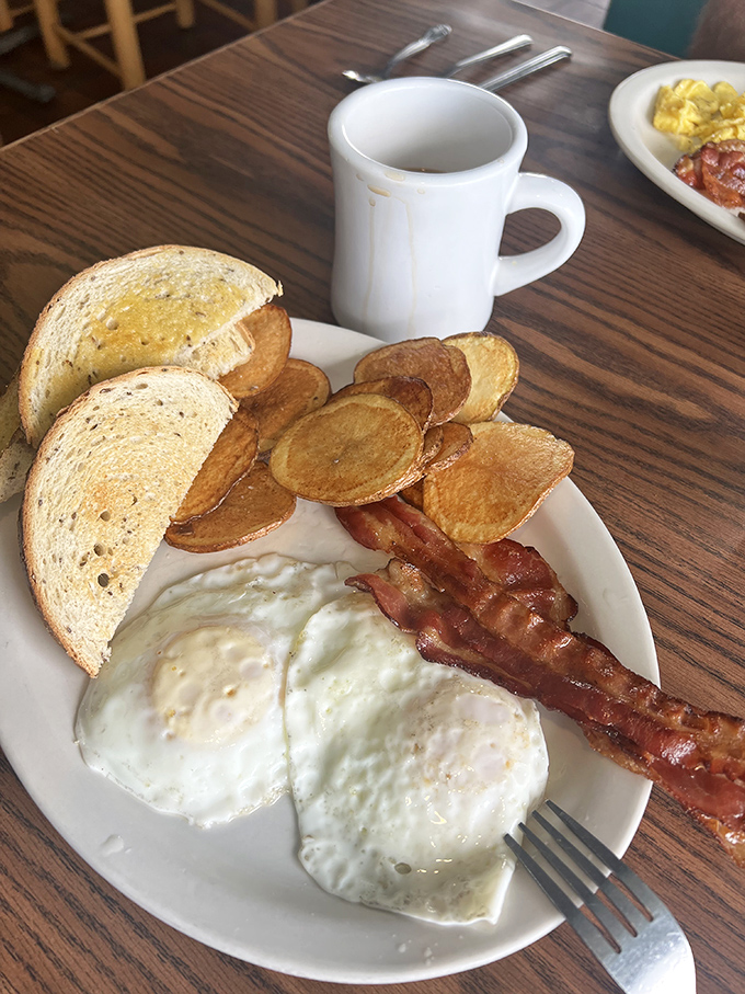 Breakfast perfection doesn't need fancy names&mdash;just perfectly cooked eggs, bacon with that ideal crisp-to-chewy ratio, and home fries that justify getting out of bed.