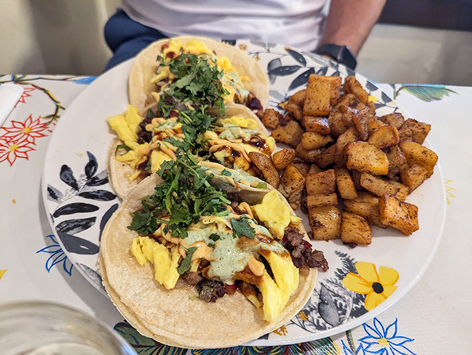 Breakfast tacos that make Monday mornings bearable! Perfectly seasoned potatoes on the side are the unsung heroes of this plate.