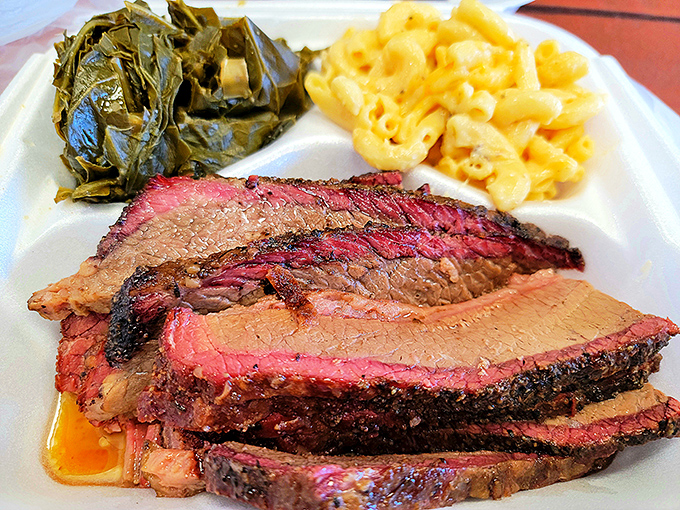 Brisket that would make a Texan weep with joy. That smoke ring isn't just for show—it's the barbecue equivalent of a Michelin star.