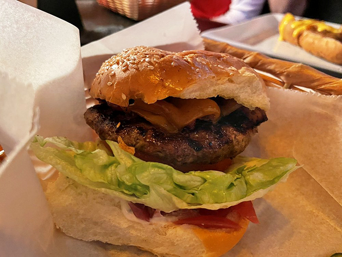 This isn't just a burger &ndash; it's edible architecture. The perfect stack of beef, cheese, and fresh toppings that makes your mouth water before the first bite.