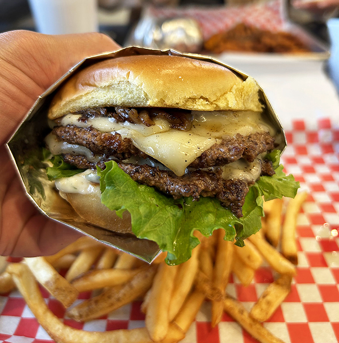 Behold: the perfect smash. Those crispy, lacy edges surrounding juicy beef create the textural contrast that burger dreams are made of.