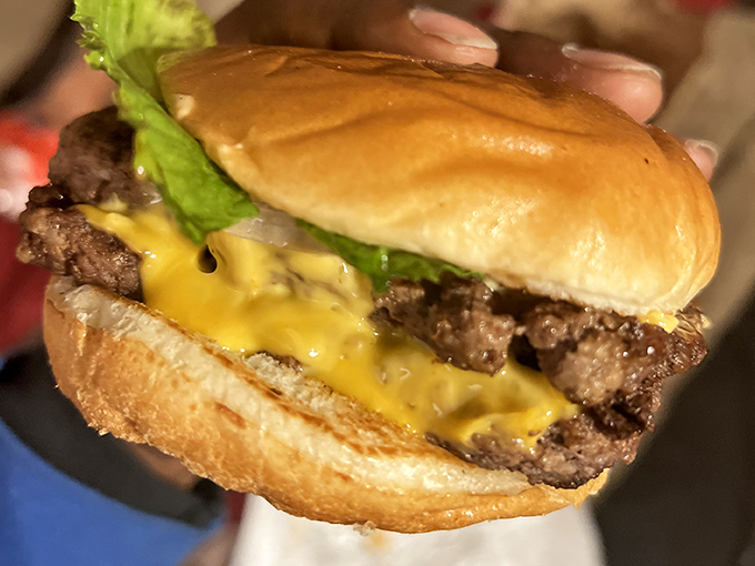 The star of the show: a perfectly square patty that reaches every corner of the bun, with cheese melting into the nooks and crannies of beefy paradise.