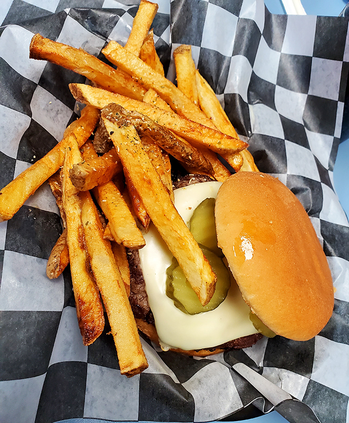 Behold the star of the show! This isn't just a cheeseburger &ndash; it's edible proof that simplicity, when executed perfectly, beats complexity every time.