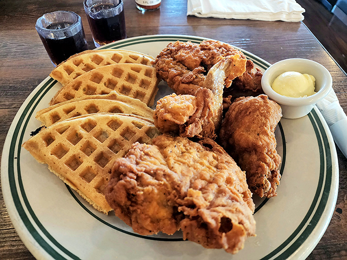 Golden waffles meet perfectly fried chicken in a dance of sweet and savory. This isn't just breakfast&mdash;it's edible joy on a plate.