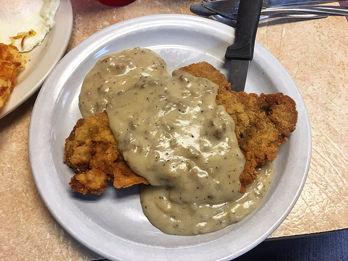 Chicken fried steak swimming in peppery gravy &ndash; a dish so comforting it should come with a warning: "May induce immediate napping or declarations of undying loyalty."
