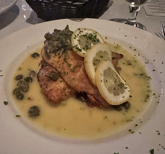 The star of the show: chicken piccata bathed in a lemon-caper sauce so good you'll contemplate drinking it straight.