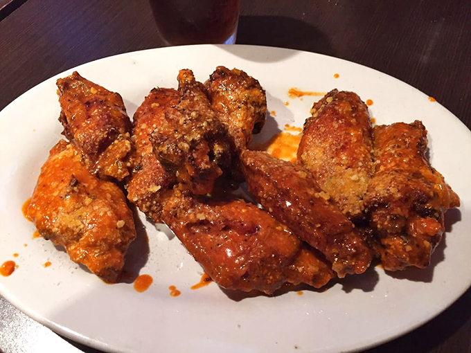 These wings aren't playing second fiddle to pizza&mdash;they're conducting their own spicy symphony of flavors that demands attention.