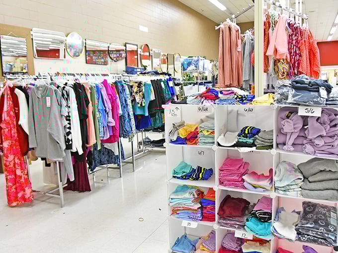 The clothing section resembles a rainbow that exploded in the most organized way possible. Those color-coded shelves are speaking my bargain-hunting love language.