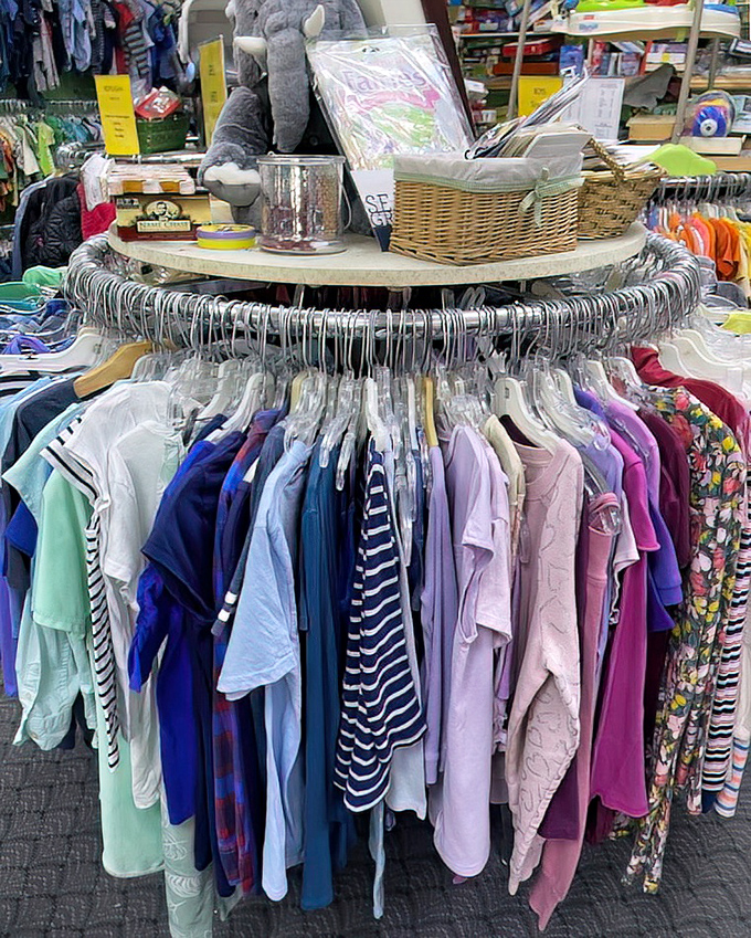 The circular clothing displays aren't just practical&mdash;they're a rainbow of possibilities where every hanger might hold your next favorite shirt or that perfect dress.