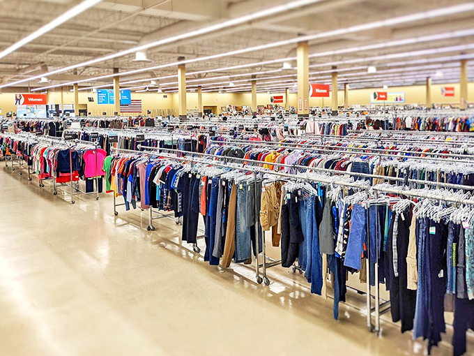 The clothing racks stretch into infinity, proving that one person's closet purge is another person's fashion jackpot.