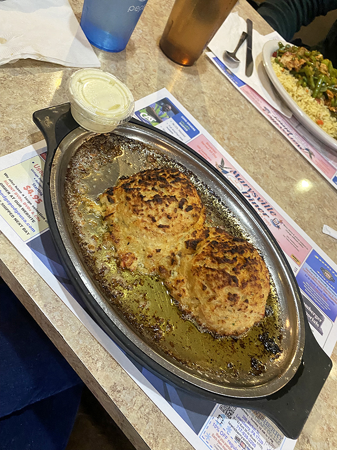 Golden-brown crab cakes sizzling in their own buttery glory&mdash;proof that breakfast can sometimes moonlight as a special occasion.