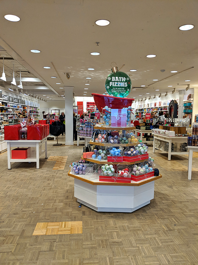 Bath & Body Works' display of "bath fizzies" &ndash; because nothing says "self-care" like turning your bathtub into a fragrant science experiment.