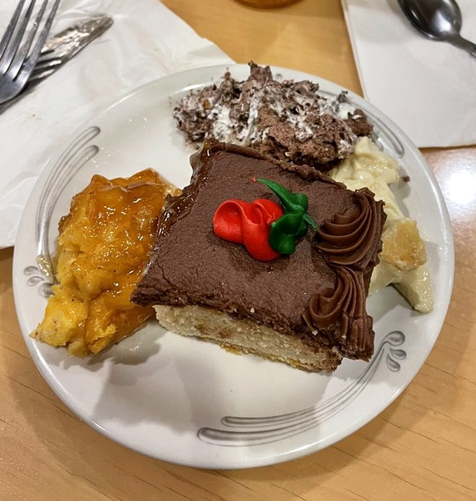 Dessert heaven on a plate. That chocolate cake isn't just calling your name &ndash; it's shouting it through a megaphone.