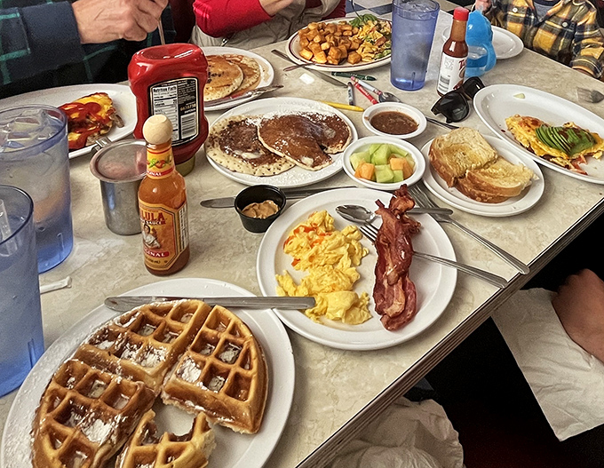 Breakfast nirvana achieved! This table tells the story of friends who know that calories don't count when they're consumed in good company.
