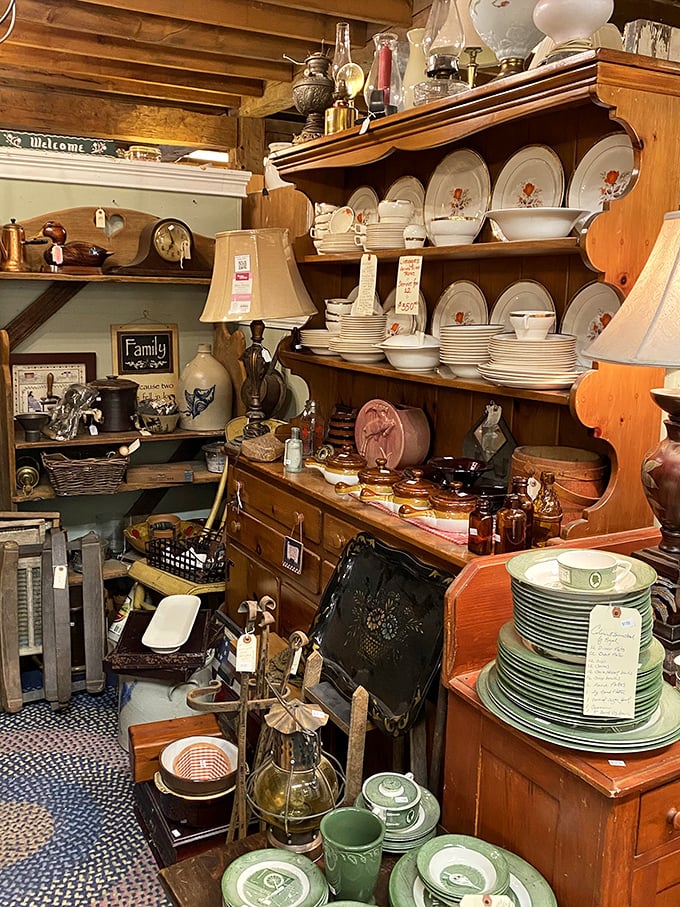 Stacked dinnerware and vintage finds create a collector's paradise where every shelf tells a different decorative story. 