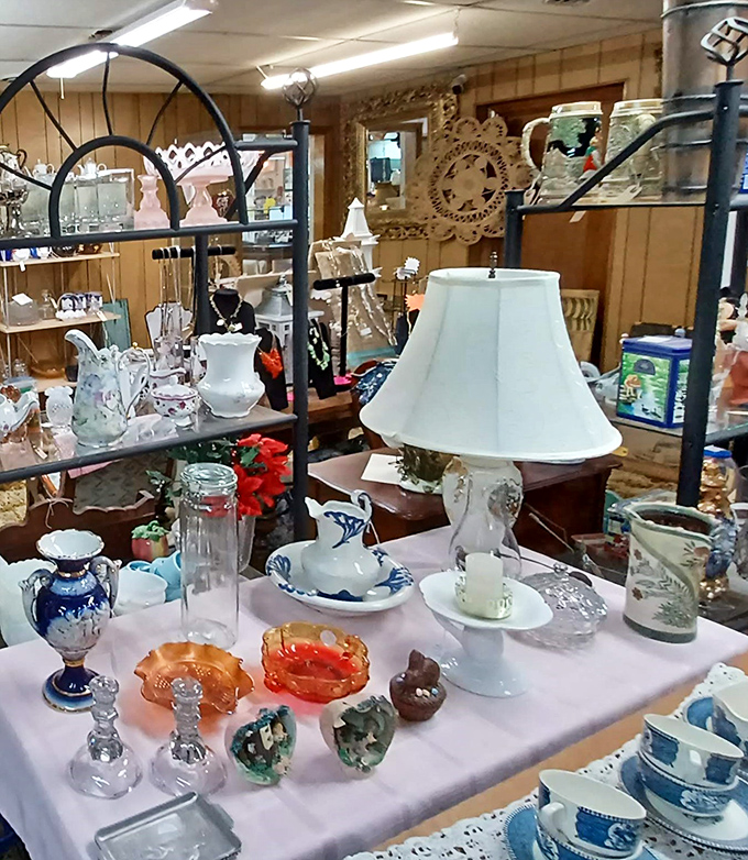 A meticulously arranged tableau of porcelain, crystal, and vintage tableware. One person's forgotten china is another's dining room conversation starter.
