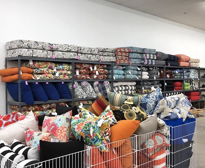 Pillow paradise! A rainbow of cushions and textiles that would make any HGTV host swoon with decorating possibilities.