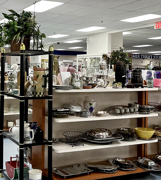 Shelves of kitchenware create a domestic treasure hunt—vintage Pyrex bowls in colors not seen since The Brady Bunch was still airing new episodes.