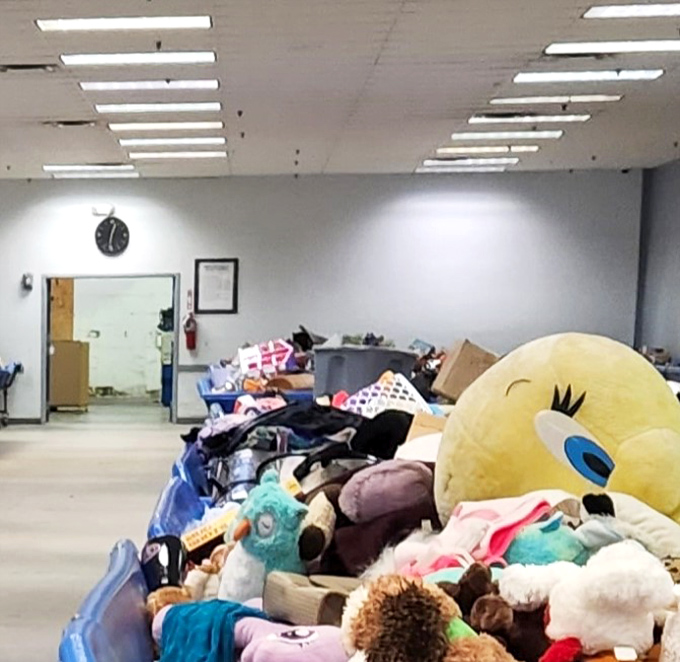 A mountain of plush toys creates a colorful landscape of childhood nostalgia. Somewhere in there might be the exact teddy bear you had at eight.