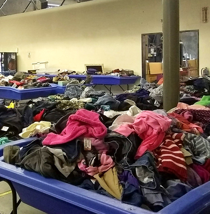 Textile archaeology at its finest! Somewhere in this colorful strata of fabrics lies the vintage band shirt you've been searching for since college.