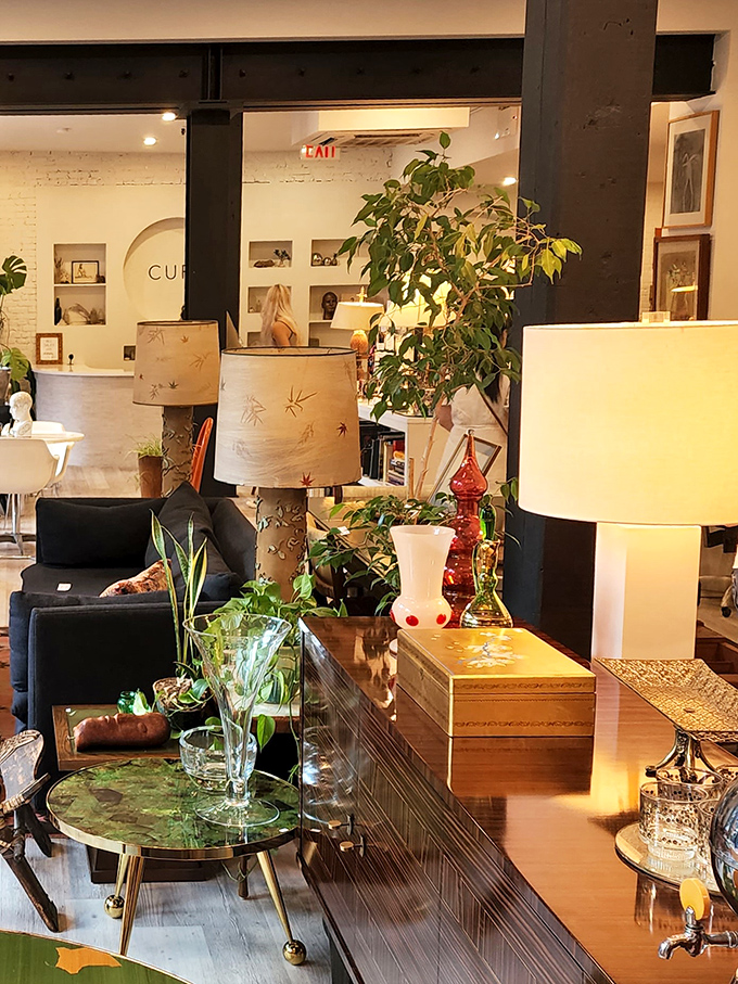 Mid-century meets modern in this carefully curated vignette where vintage lamps and decorative objects create an instant conversation starter.