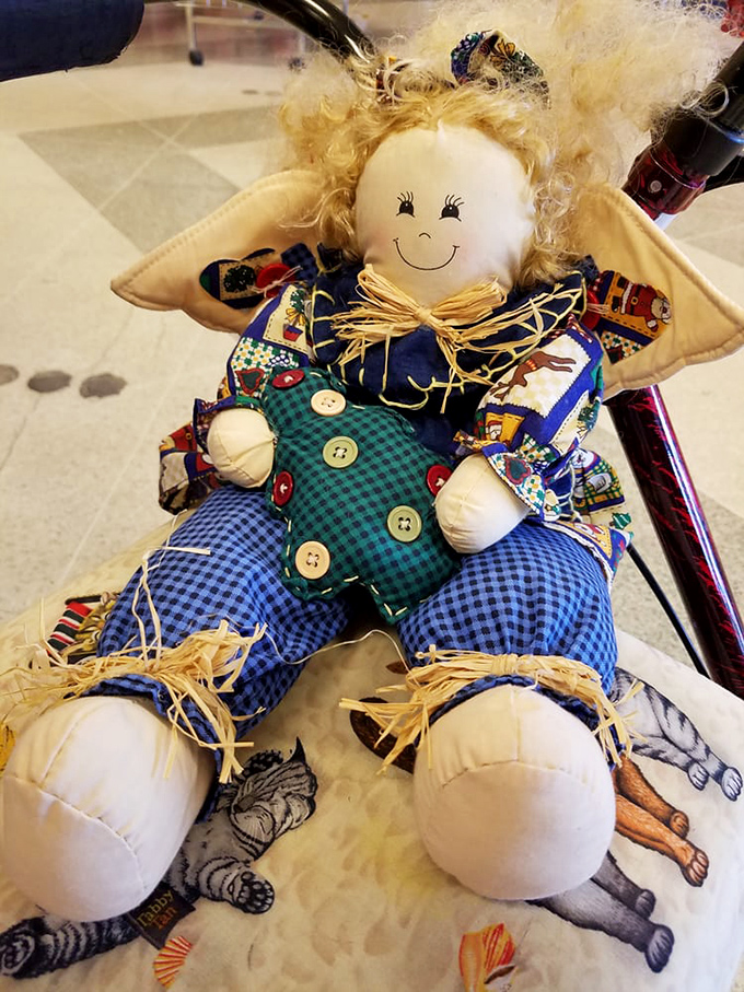 This handcrafted scarecrow doll isn't just decoration—it's someone's crafting masterpiece waiting for its second act in your home's seasonal display rotation.