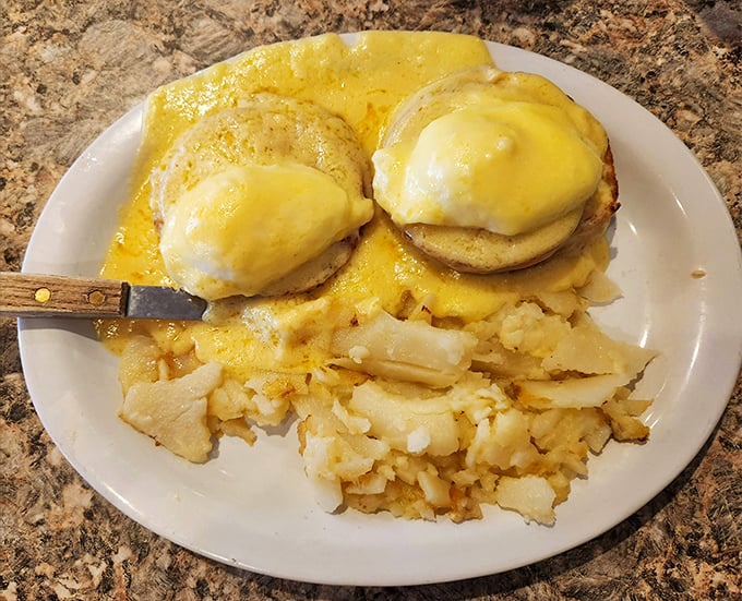 Eggs Benedict that would make the Pope jealous&mdash;perfectly poached eggs nestled on English muffins, draped in hollandaise that's practically liquid gold.