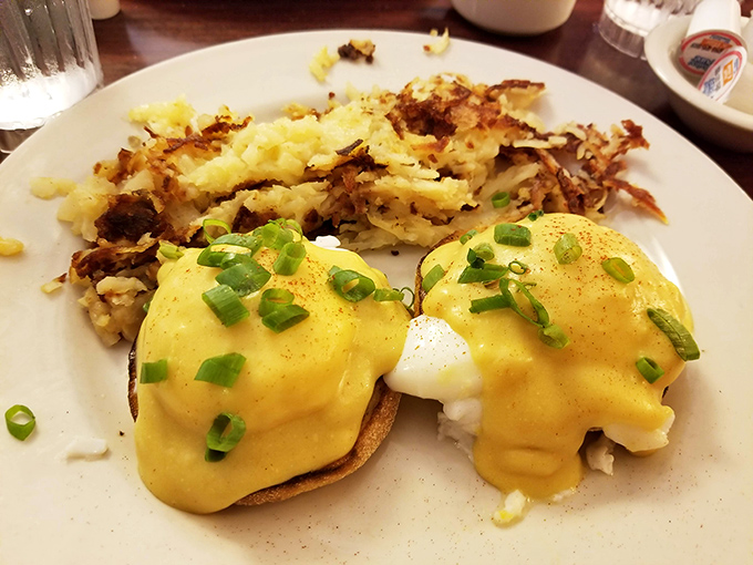 Behold the Benedict that launched a thousand brunch trips&mdash;golden hollandaise cascading over perfectly poached eggs like sunrise over the Great Lakes.