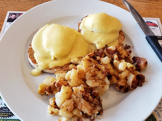Eggs Benedict done right is poetry on a plate. This golden hollandaise cascading over English muffins might just make you forget your own name.