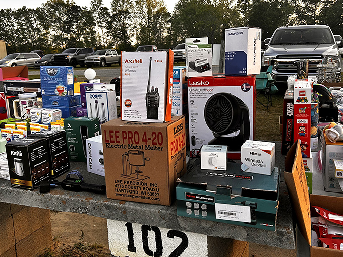 Booth 102 looks like someone raided a Best Buy circa 2018&mdash;coffee makers, fans, and metal melters for the person who has everything except that.