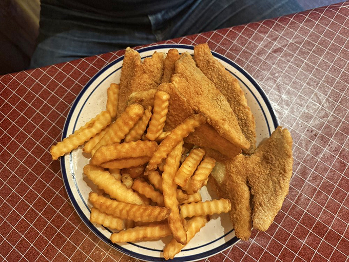 Golden-battered perch fillets and crinkle-cut fries&mdash;a plate that doesn't need fancy plating when it tastes like the best day at the lake.