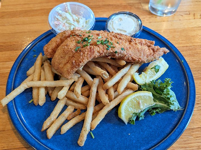 Golden perfection meets crispy satisfaction in this fish and chips that would make any British pub jealous.