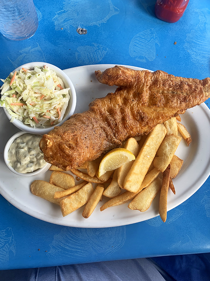 Fish and chips that would make a British pub jealous&mdash;golden-battered perfection with coleslaw that didn't come from a bucket.