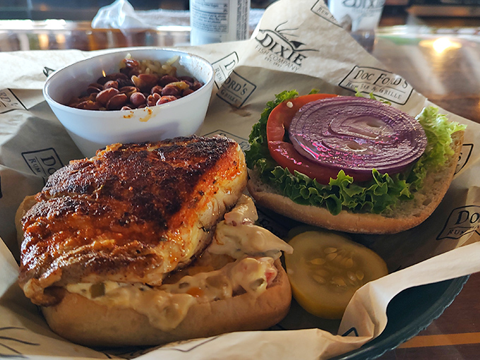 This blackened fish sandwich isn't just lunch – it's a Florida initiation ritual. That remoulade sauce should be bottled and sold as a condiment revolution.