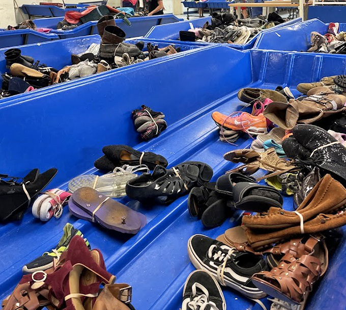 The footwear section: where Cinderella's lost slipper might be hiding between designer boots and barely-worn sneakers.