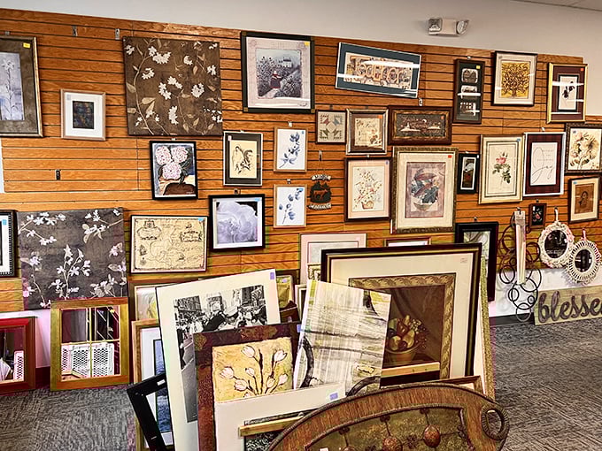 The wall of framed artwork offers instant home makeovers without the HGTV budget. One person's decluttered wall becomes another's gallery.