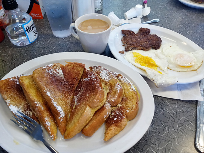 Breakfast nirvana knows no clock. Town Topic's golden French toast and hearty steak and eggs prove morning magic happens 24/7 here.