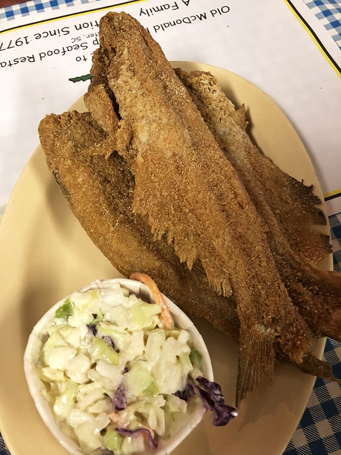 Cornmeal-crusted catfish that flakes at the touch of a fork, paired with creamy coleslaw&mdash;a South Carolina love story.