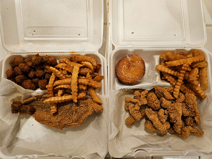 Styrofoam containers barely contain the bounty: crispy nuggets, golden fillets, and crinkle-cut fries that could make a potato proud.