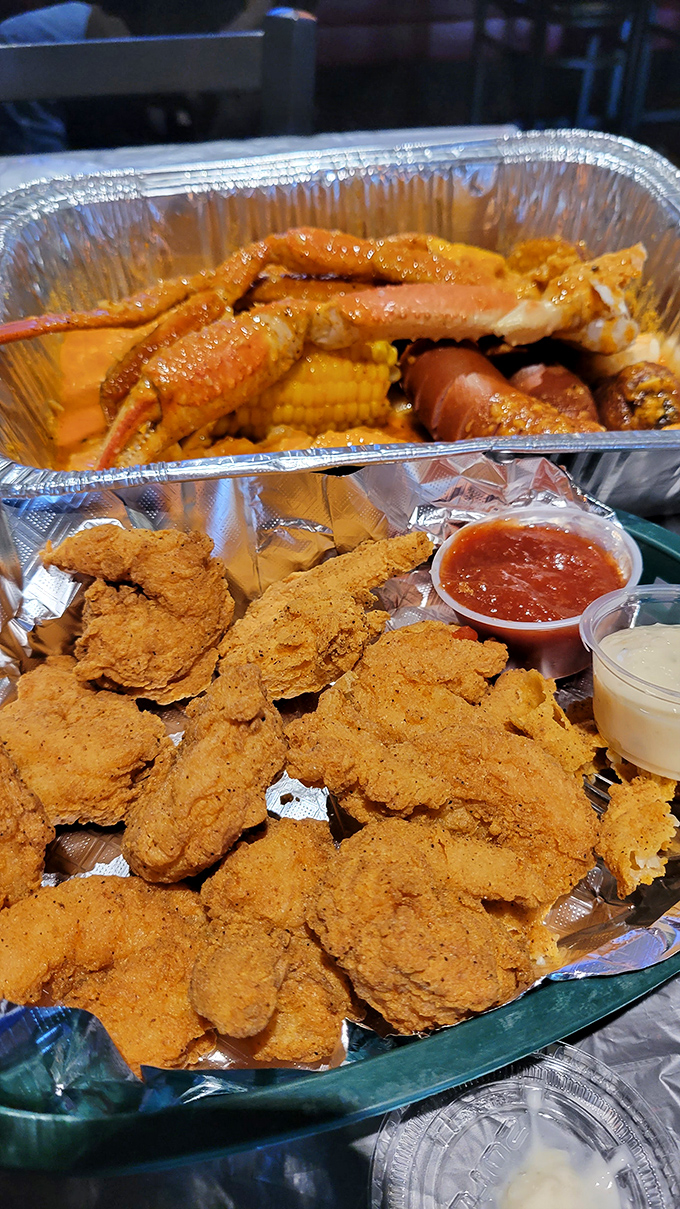 Golden-fried perfection meets seafood boil abundance. This platter doesn't just feed your hunger&mdash;it feeds your soul's deepest Cajun cravings.