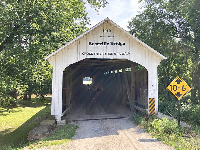 White trim, red walls, and a tunnel through time&mdash;covered bridges are basically barns with better views.