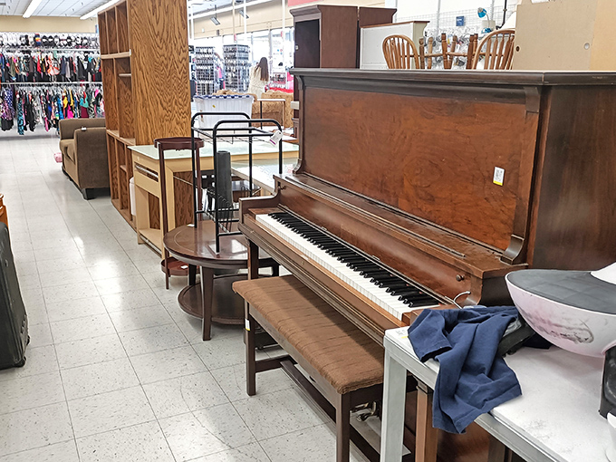 That vintage upright piano isn't just furniture—it's someone's childhood memories, another person's future heirloom, all waiting for its next chapter.
