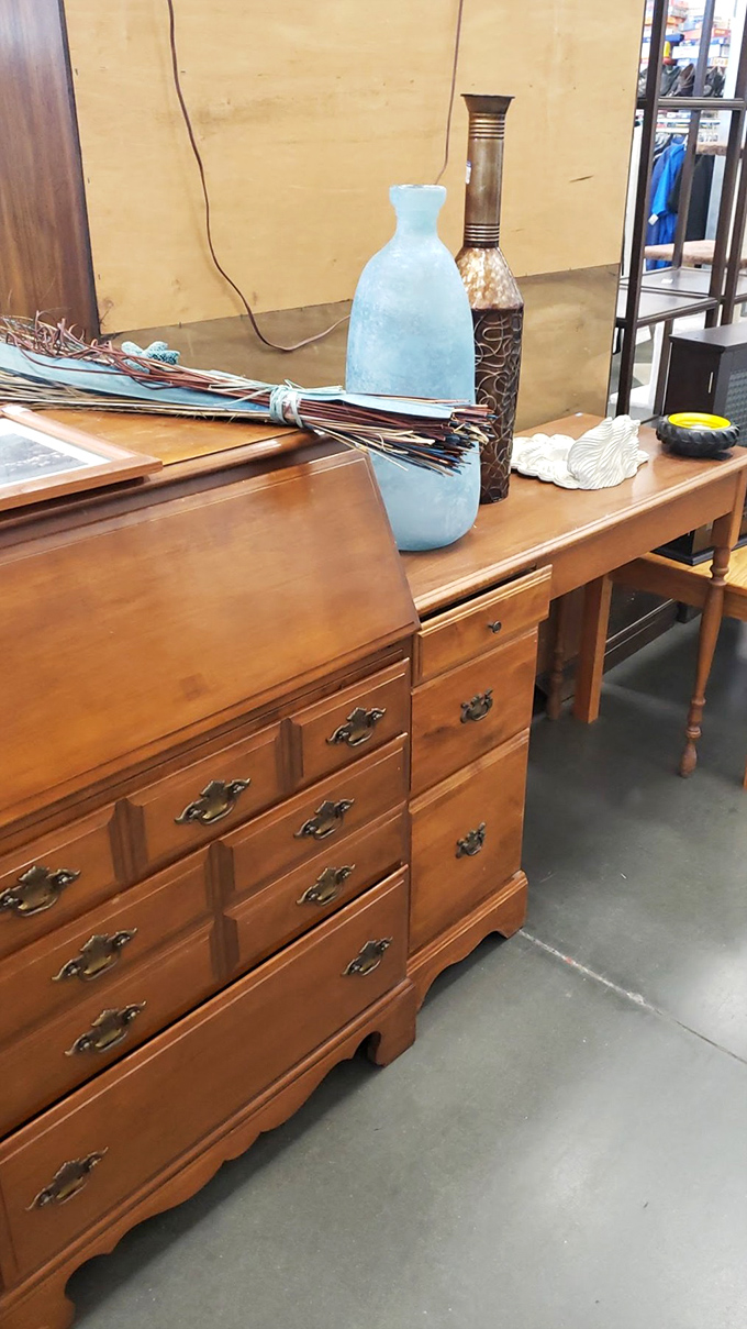 That honey-toned desk isn't just furniture; it's someone's future heirloom waiting for its second chapter at a fraction of retail.