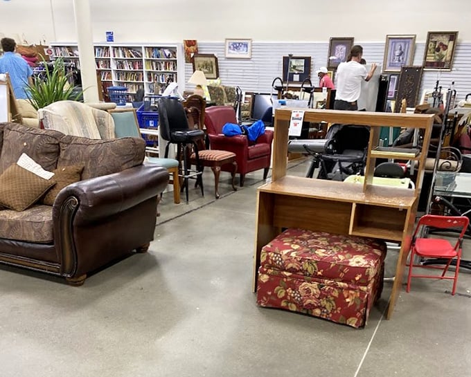 The furniture section: where vintage leather meets floral patterns in a showroom that's part time capsule, part decorator's playground.